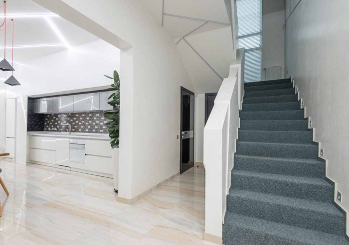 What is carpet laying and how does it work