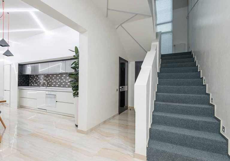 What is carpet laying and how does it work